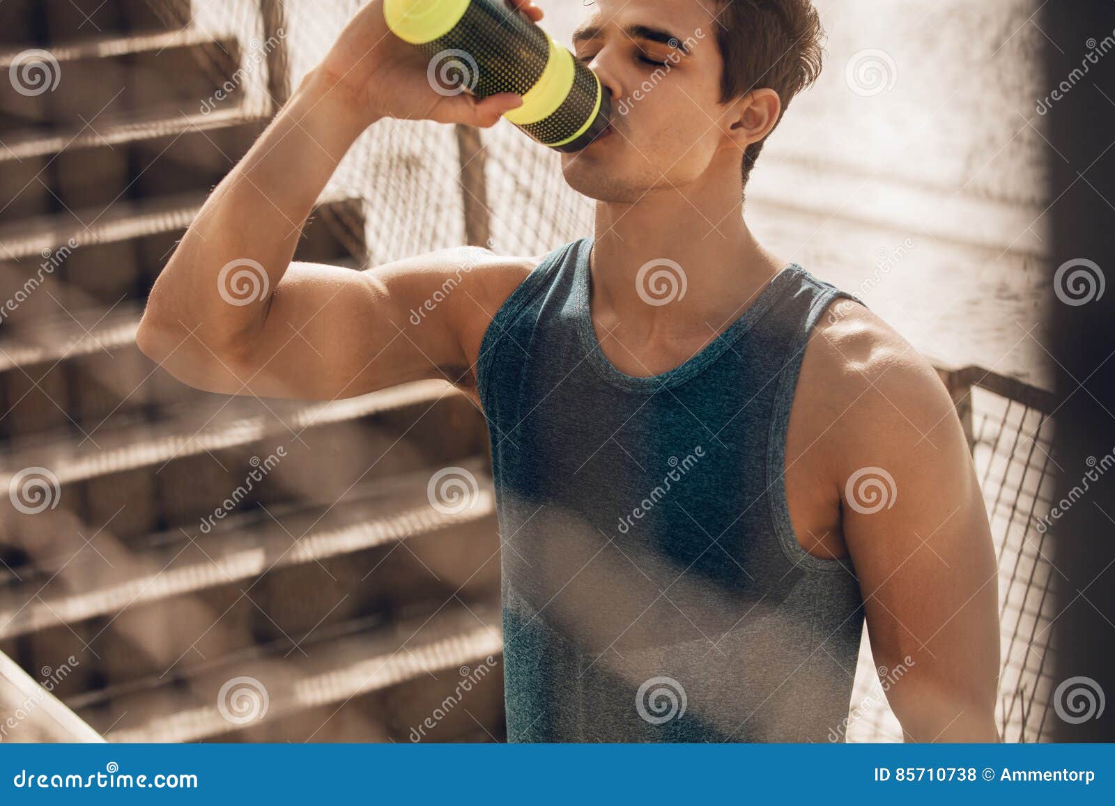 Muscular Young Man Drinking Water after Workout Stock Photo - Image of ...