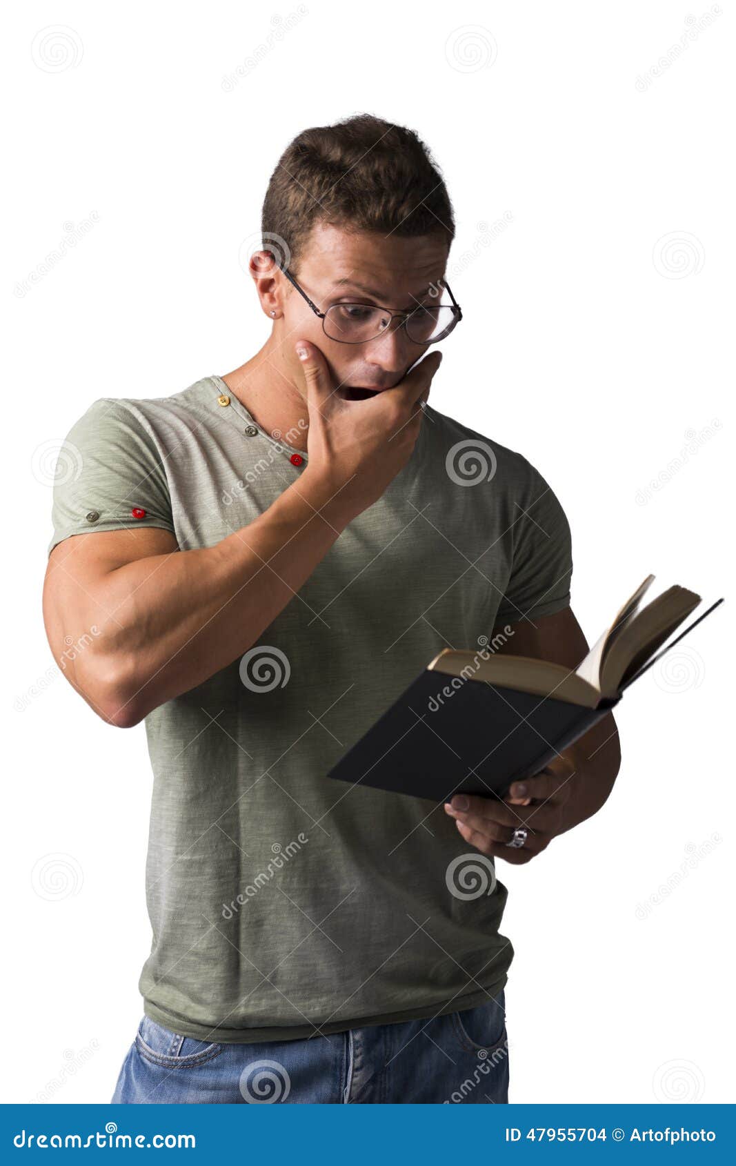 Muscular Young Man Standing Reading Book with Surprised Expression ...