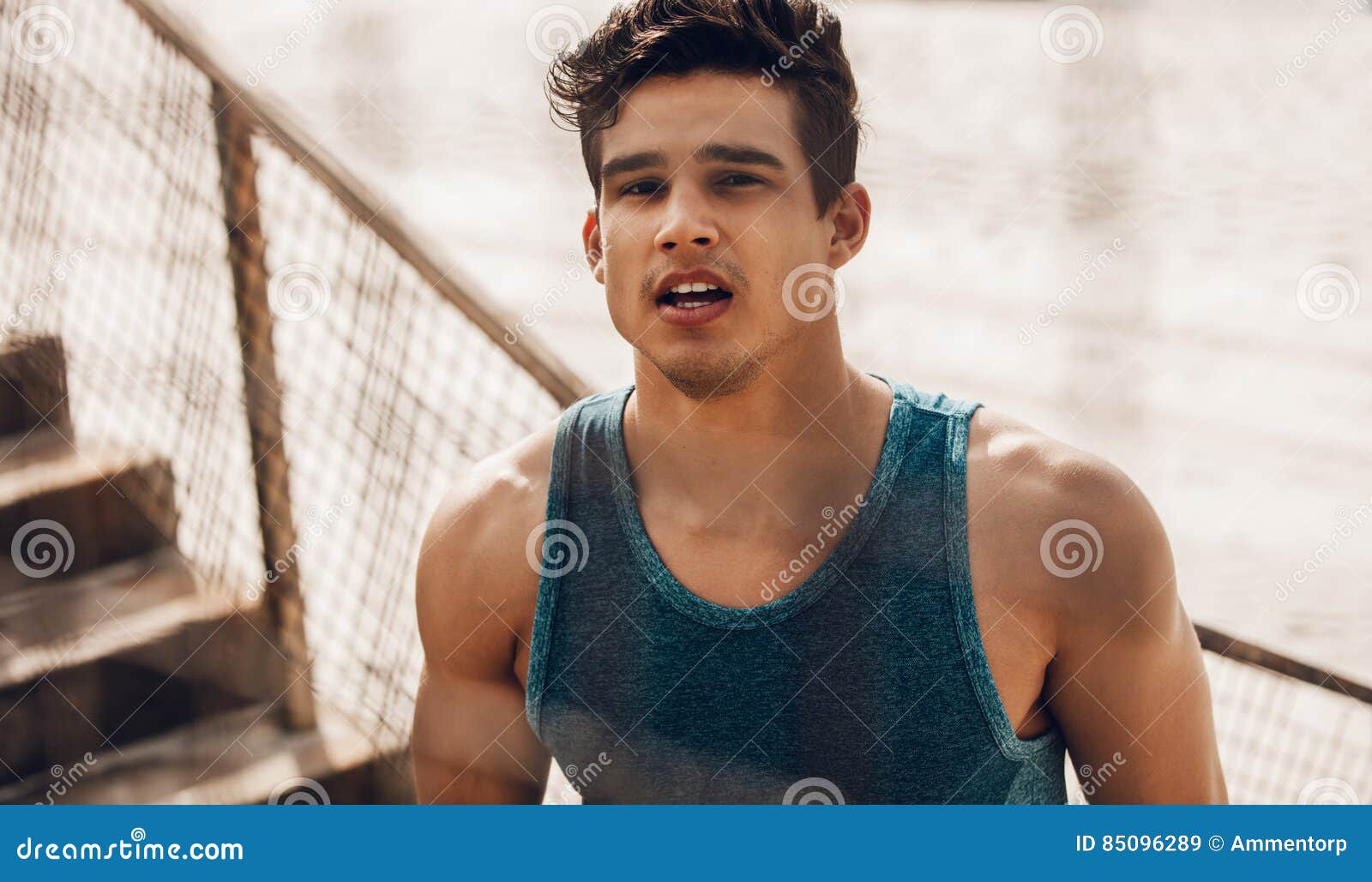 Muscular Young Man Taking a Break after Workout Stock Image - Image of ...