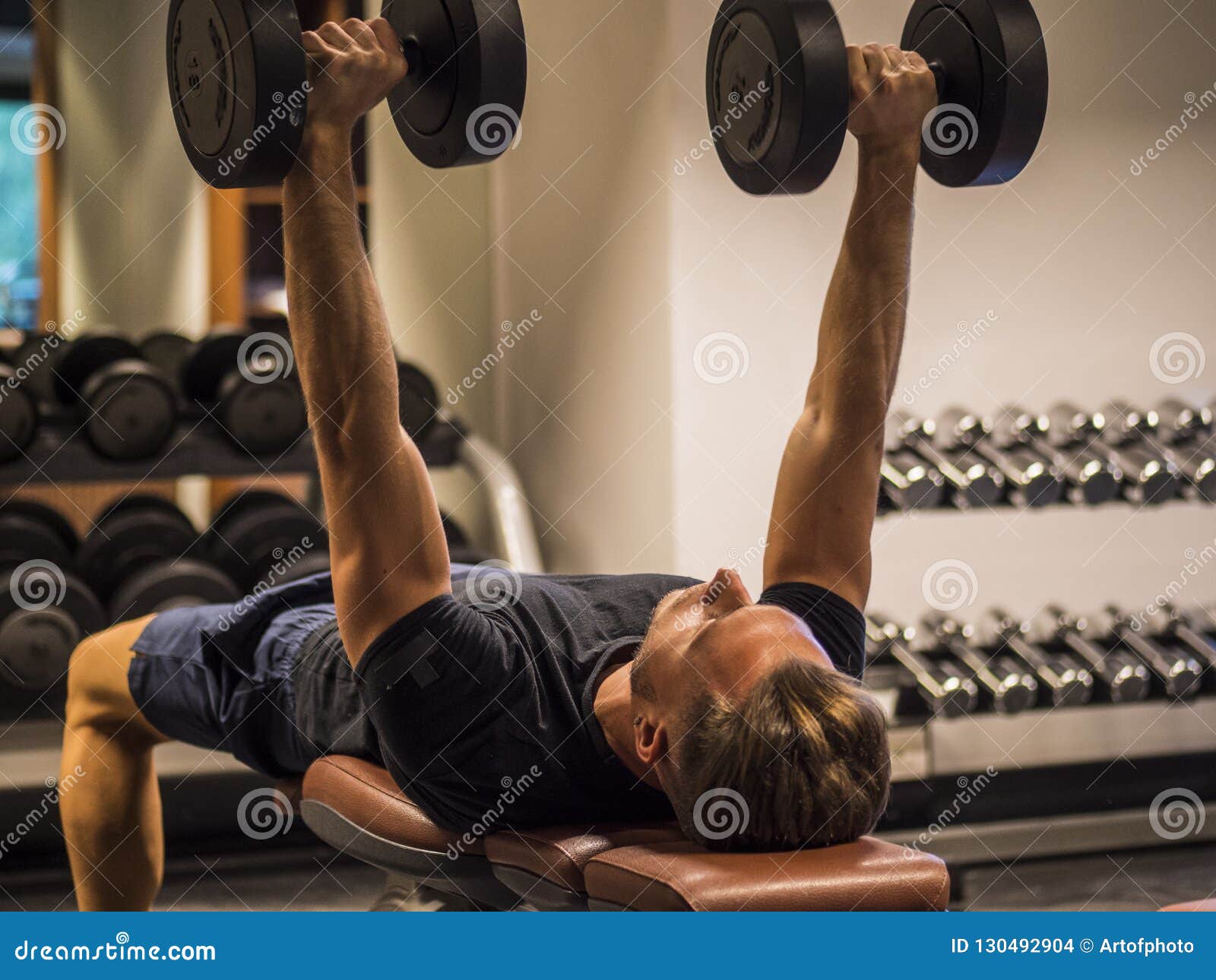 Muscular Young Man, Training Pecs on Gym Bench Stock Photo - Image of ...
