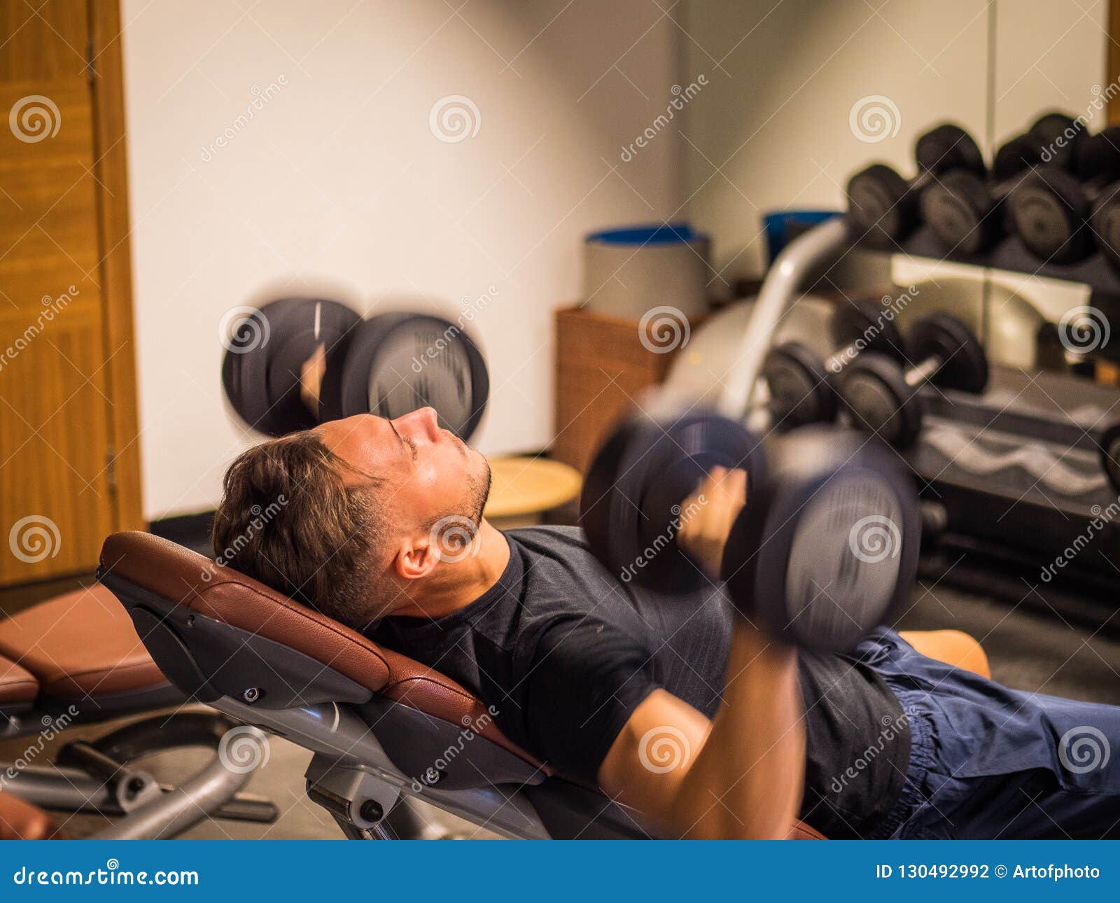 Muscular Young Man, Training Pecs on Gym Bench Stock Photo - Image of ...