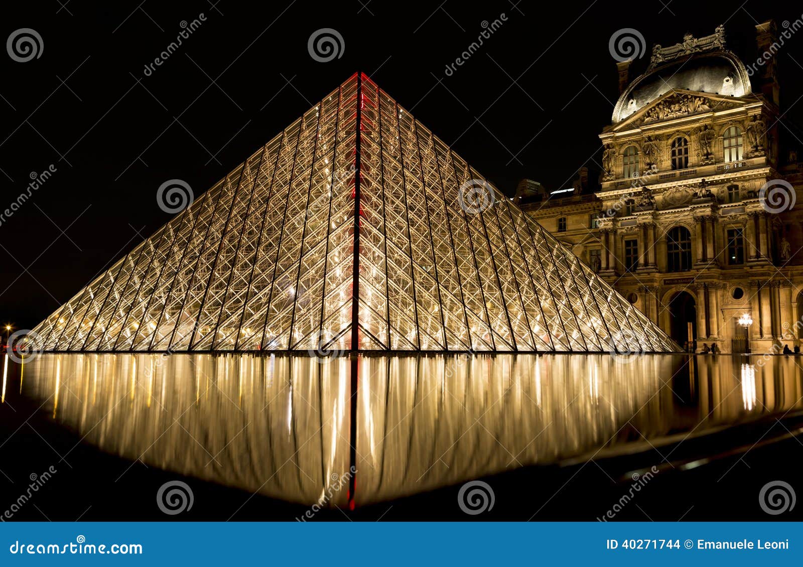 Musee Du Louvre Sign In Front Of The Large Glass Pyramid At The Louvre ...