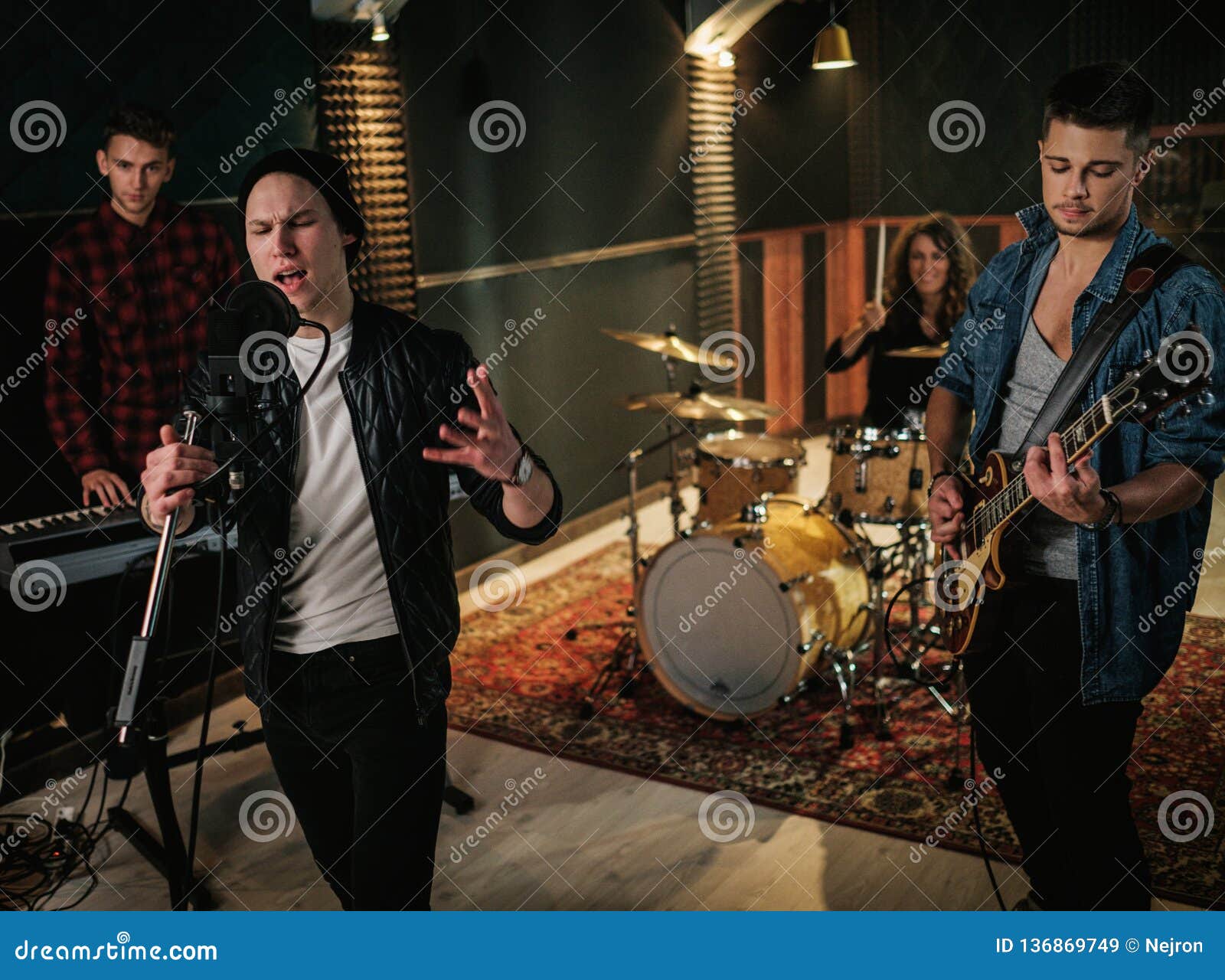 Music Band Having Rehearsal in a Studio Stock Image - Image of ...