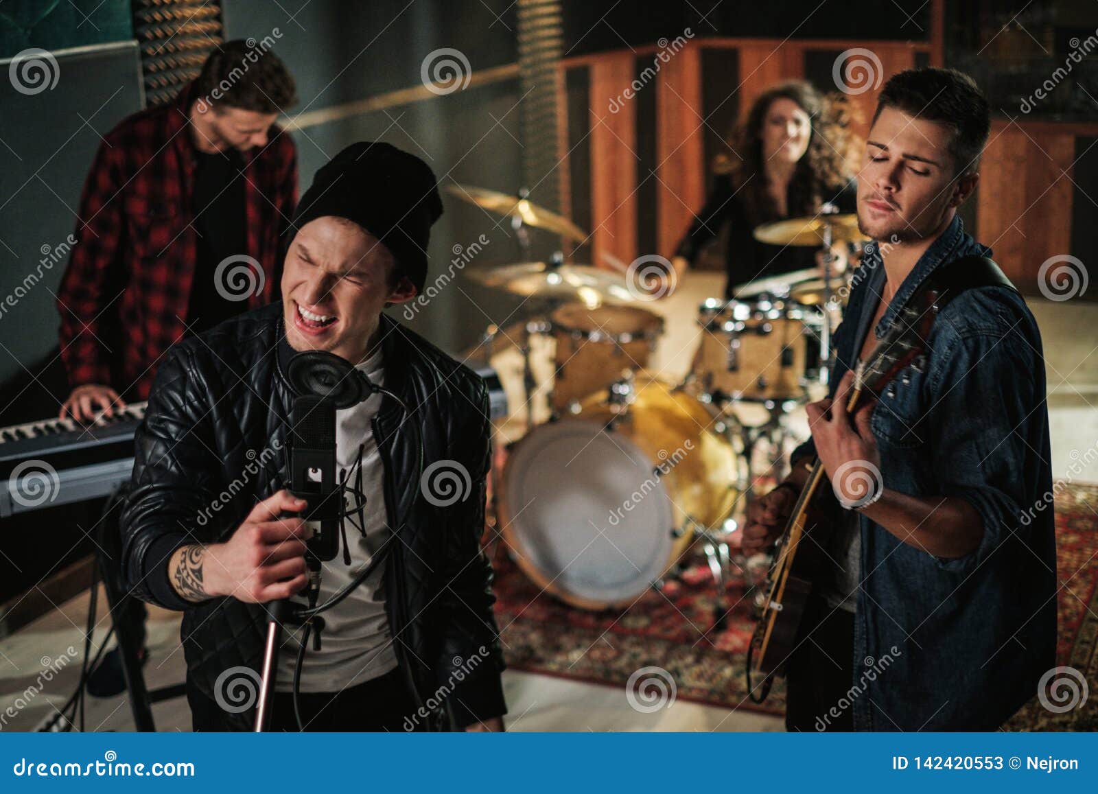 Music Band Having Rehearsal in a Studio Stock Image - Image of ...