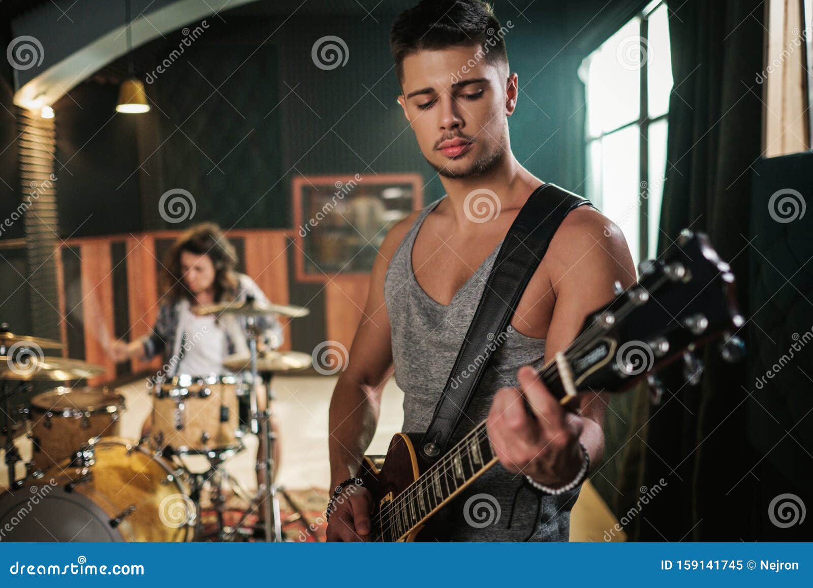 Music Band Having Rehearsal in a Studio Stock Image - Image of beat ...