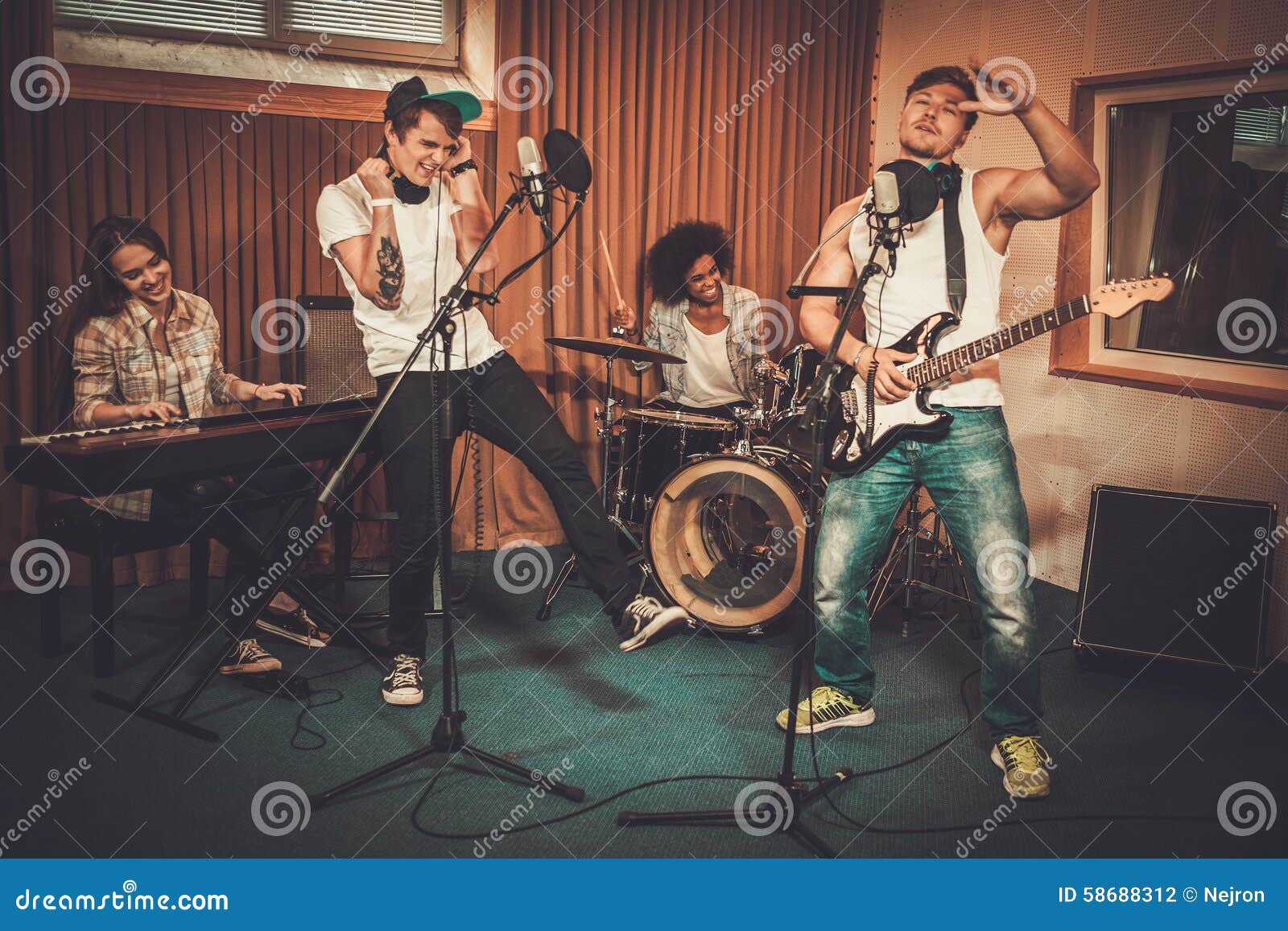 Music Band Performing in a Studio Stock Photo - Image of recording ...