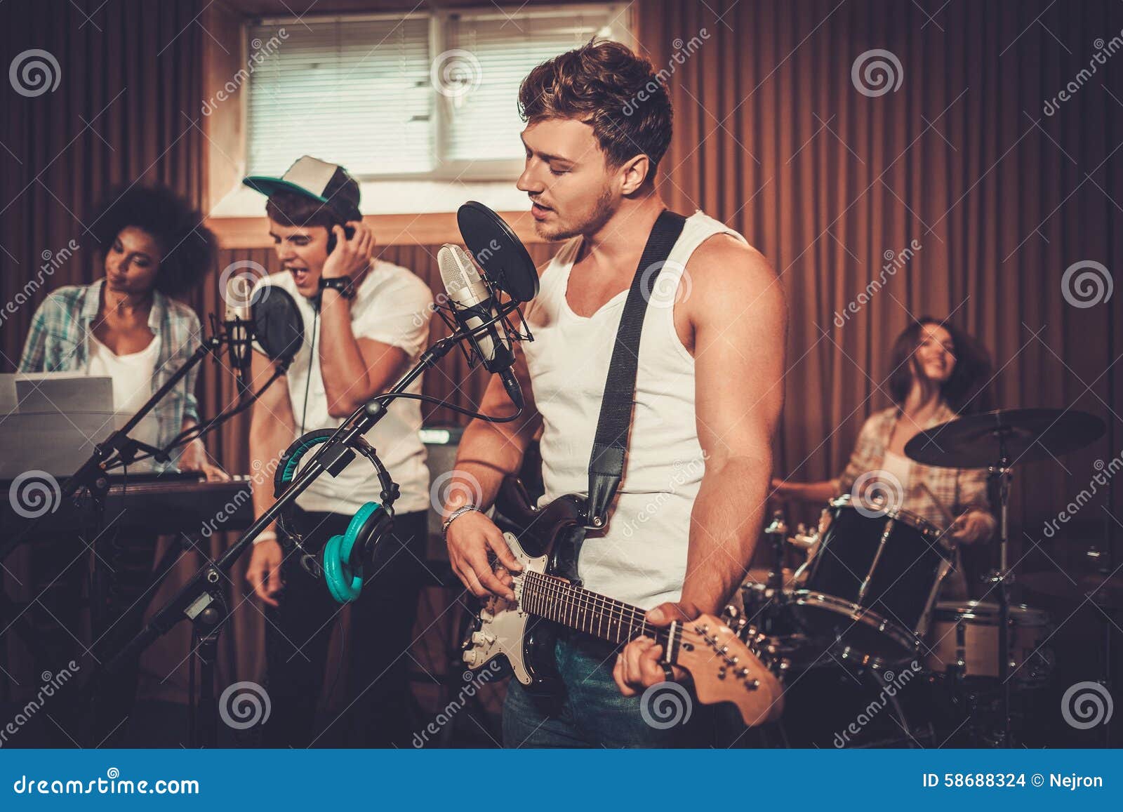 Music Band Performing in a Studio Stock Photo - Image of concert ...