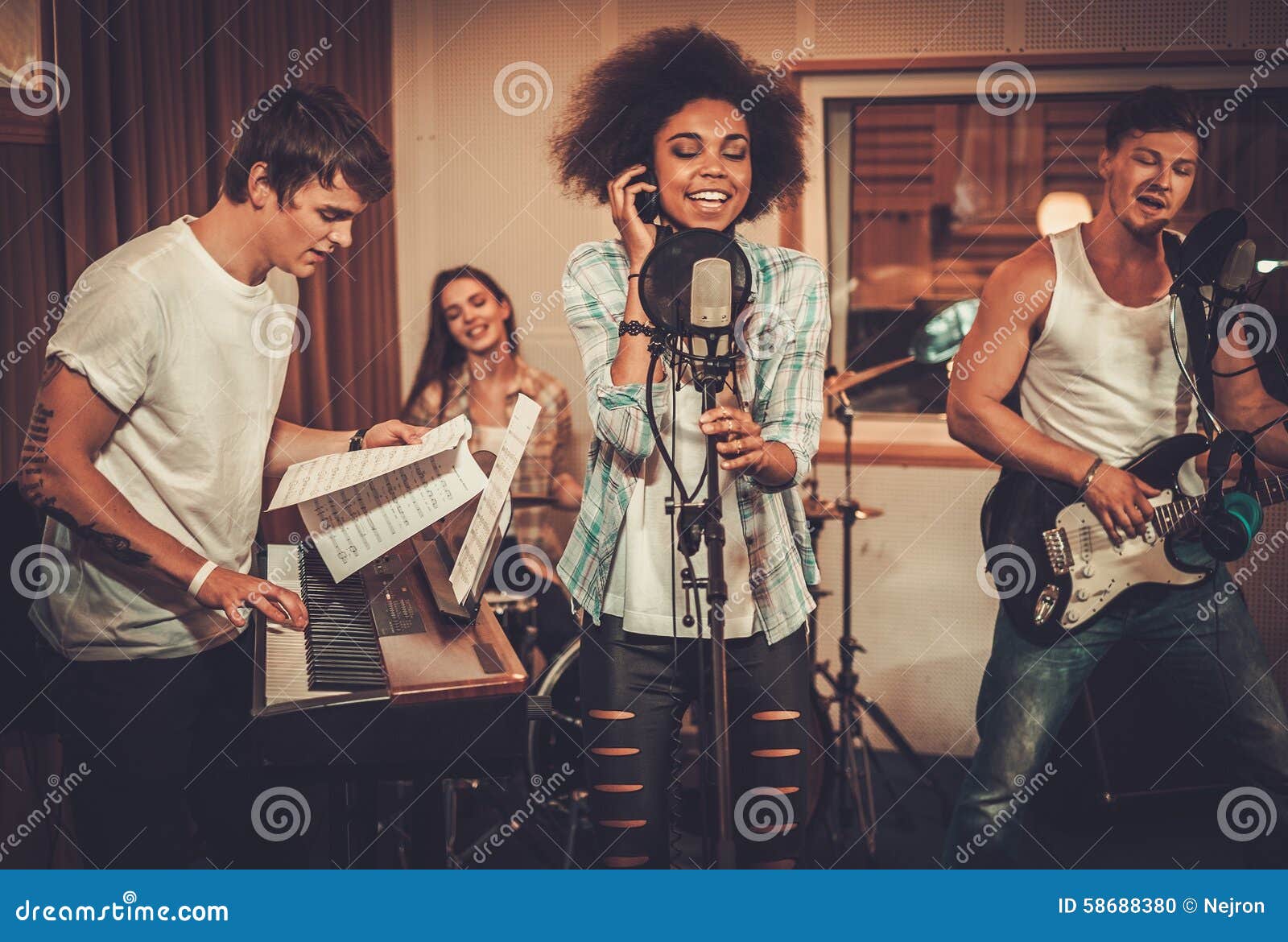 Music Band Performing in a Studio Stock Photo - Image of band ...