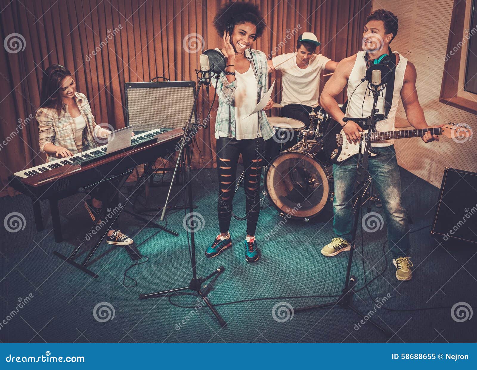 Music Band Performing in a Studio Stock Image - Image of guitar, group ...