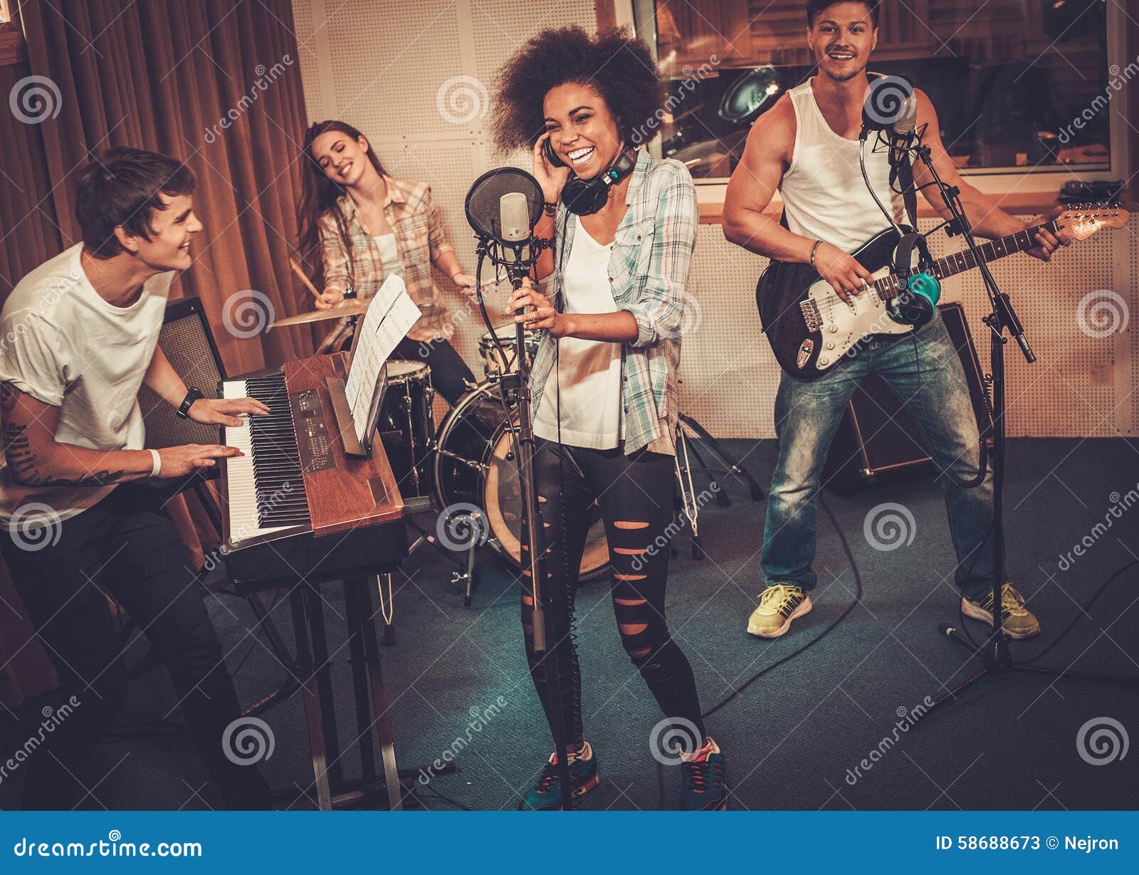 Music Band Performing in a Studio Stock Image - Image of playing ...