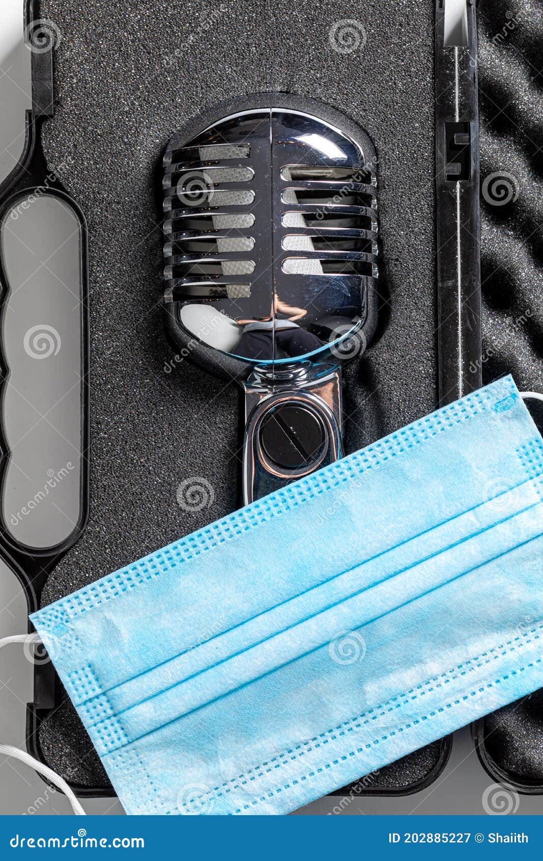 Music Business and Coronavirus Restriction. Microphone and Blue Mask ...