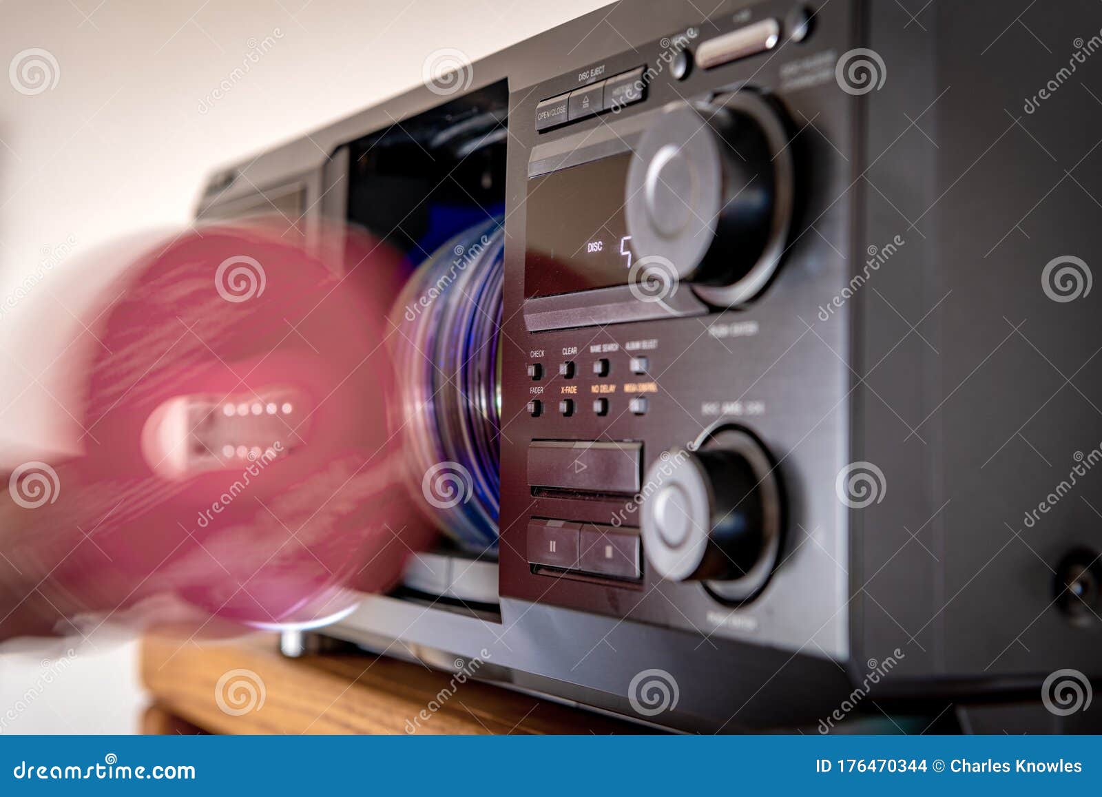 Music CD Insertion into a Music Player Stock Photo - Image of blur ...