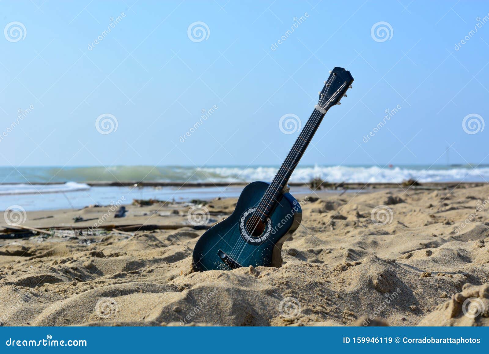 A Classical Guitar on the Beach in Front of the Sea Stock Image - Image ...
