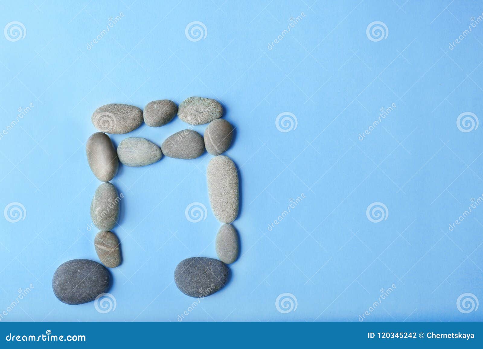 Music Note Sign Made of Stones on Blue Background Stock Photo - Image ...