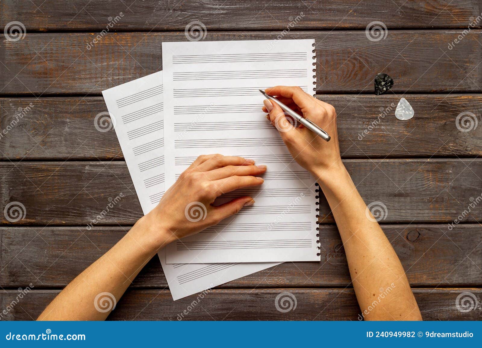 Music Sheets with Hands Writing Notes. Compose Music Concept Stock ...