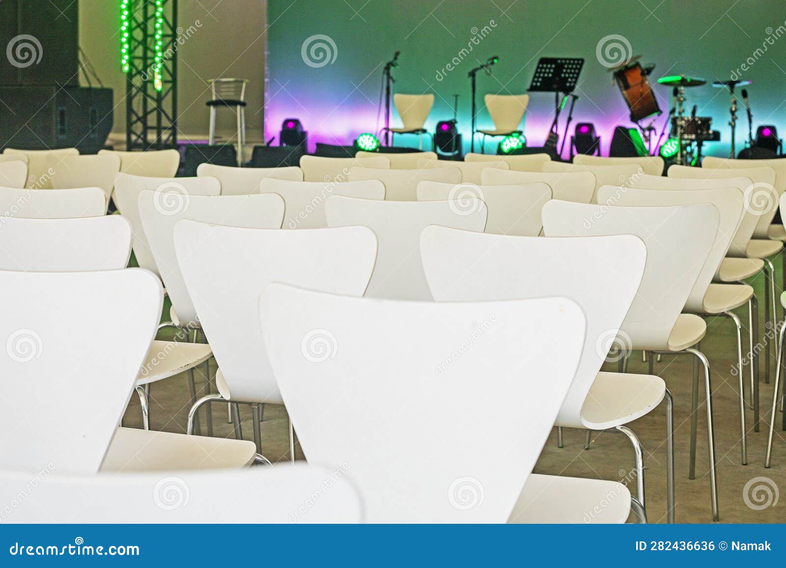 Music Stage before Performance with White Chairs. Stock Photo - Image ...