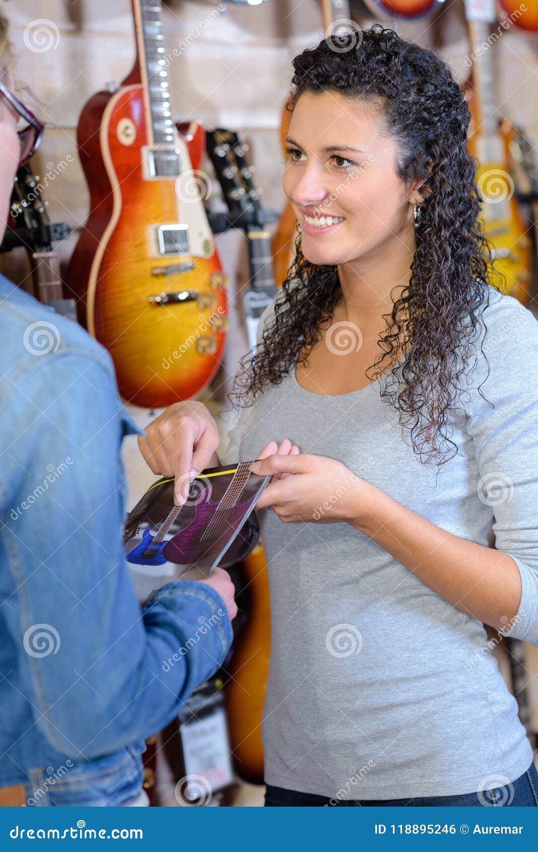 At the music store stock photo. Image of store, guitar - 118895246