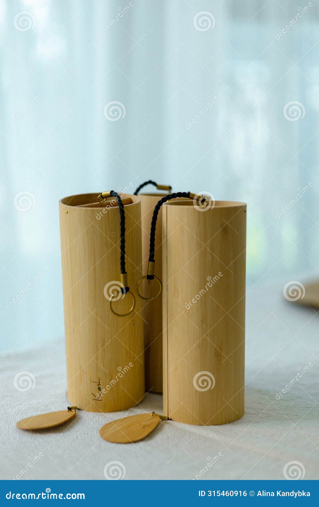 Music of the Wind - Bells Sounds of the Elements Standing on a Table in ...