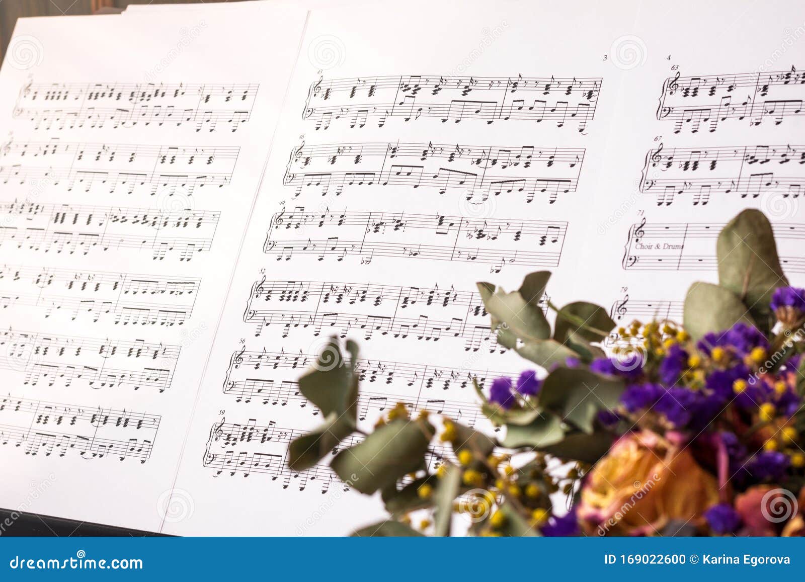 Piano sheets with flowers stock photo. Image of sheets - 169022600