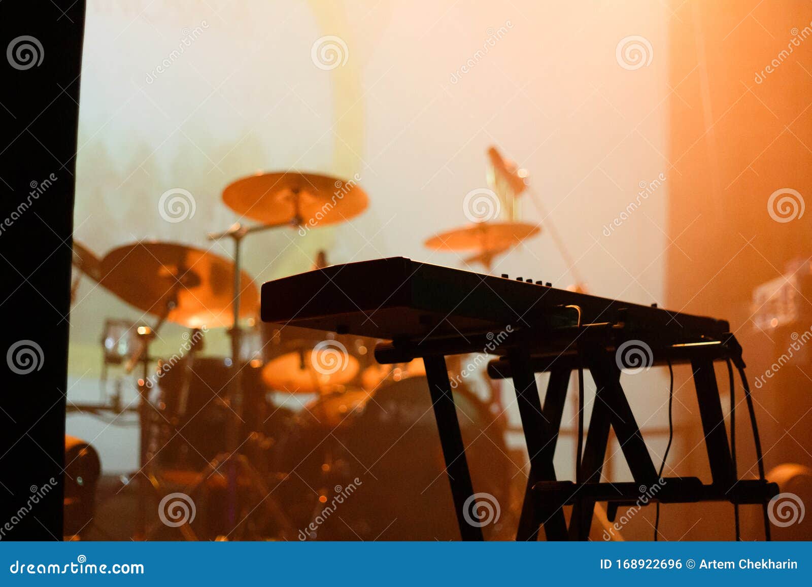 Musical Instruments on the Stage Filled with Orange Light Stock Photo ...
