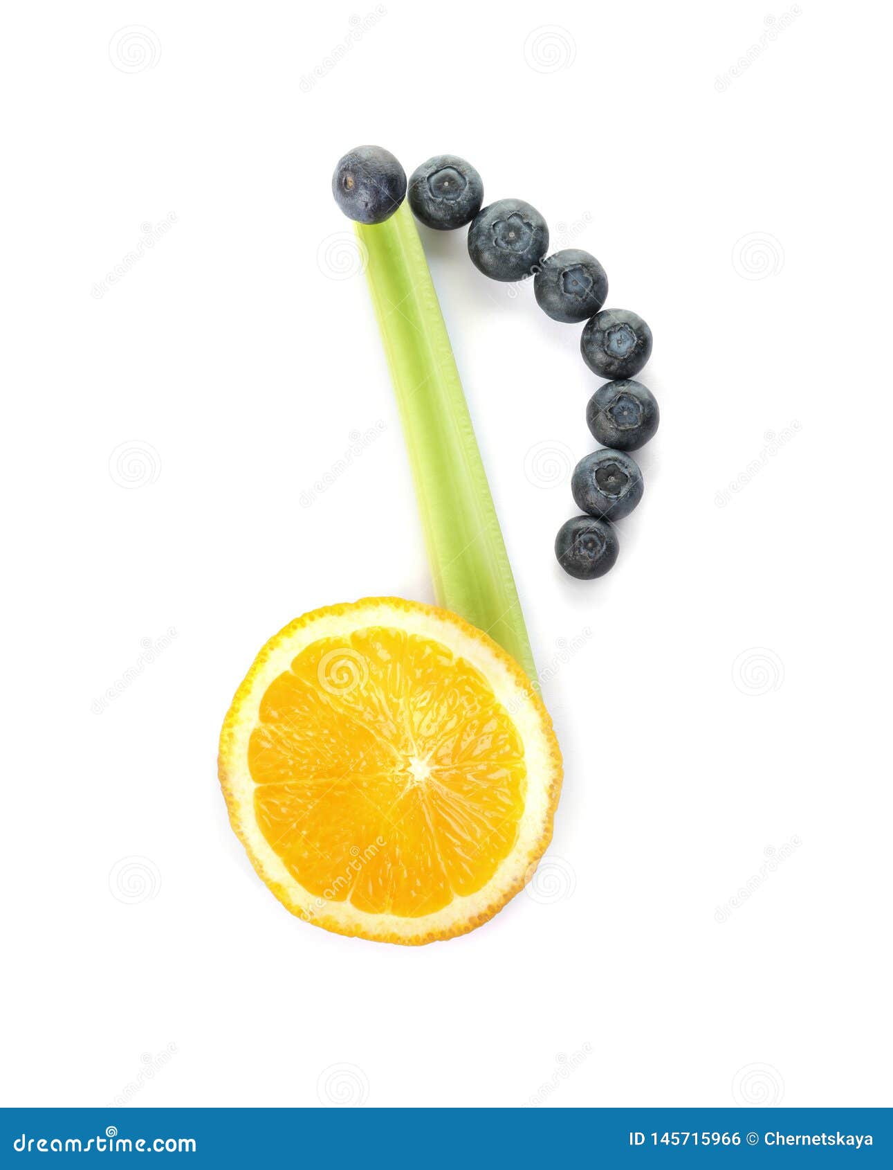 Musical Note Made of Lemon, Celery and Berries on White Background ...