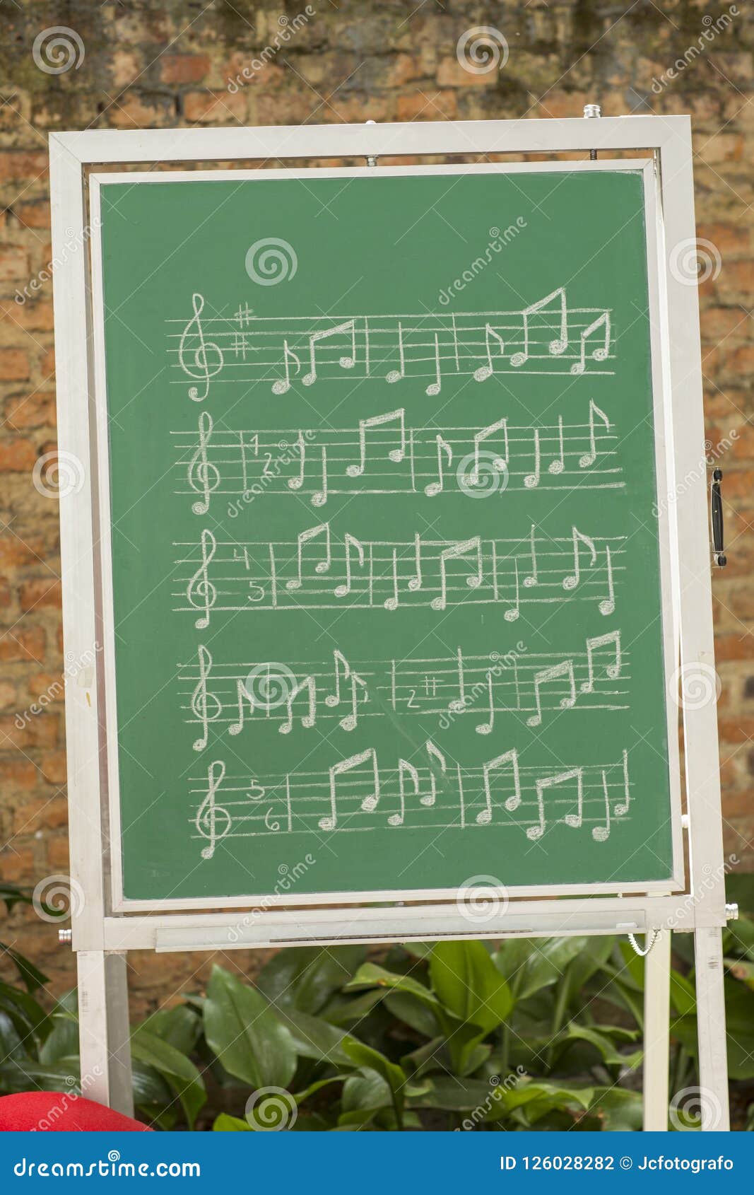 Musical Notes on Green Chalkboard Stock Photo - Image of musical, green ...