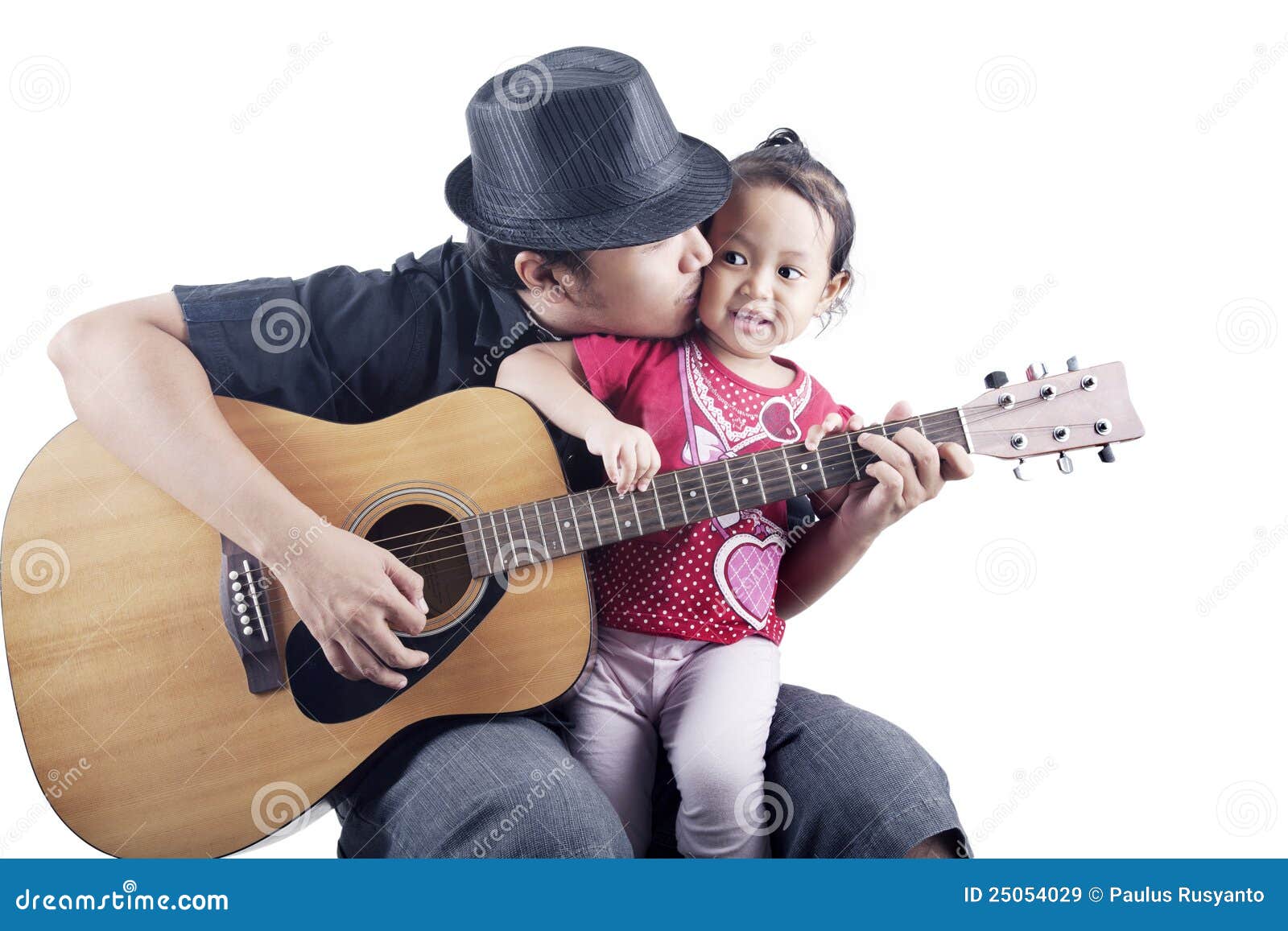 Musician with his daughter stock image. Image of parent - 25054029