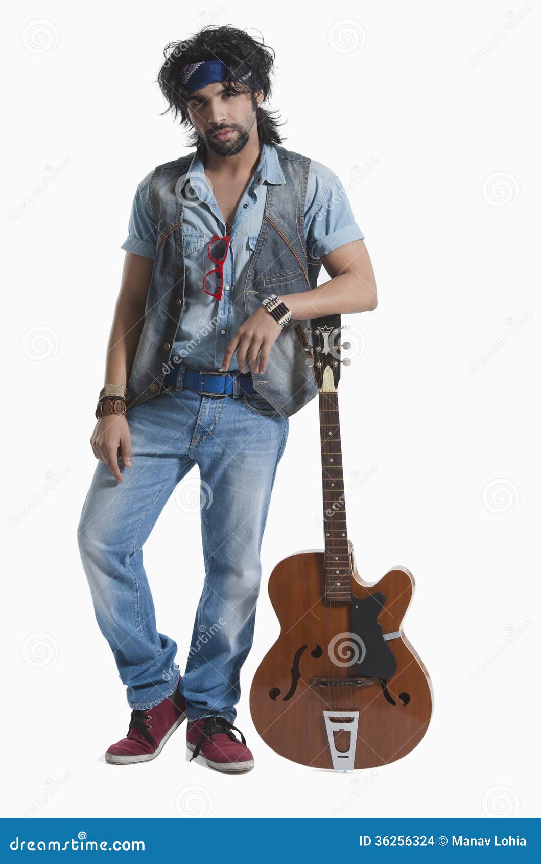 Musician holding a guitar stock photo. Image of portrait - 36256324