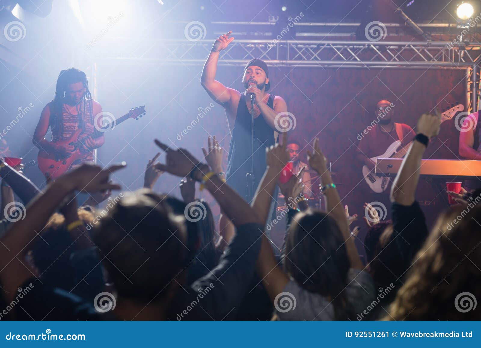 Musician with Performance Group Singing at Nightclub Stock Image ...