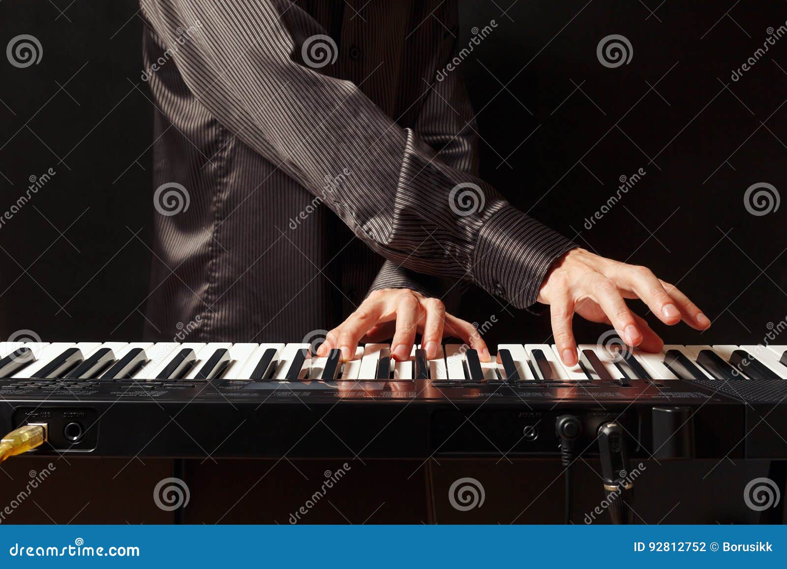 Musician Playing the Synth on Black Background Stock Photo - Image of ...