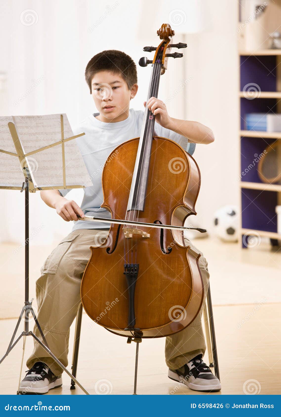 Musician Practices Performing on Cello Stock Photo - Image of performer ...