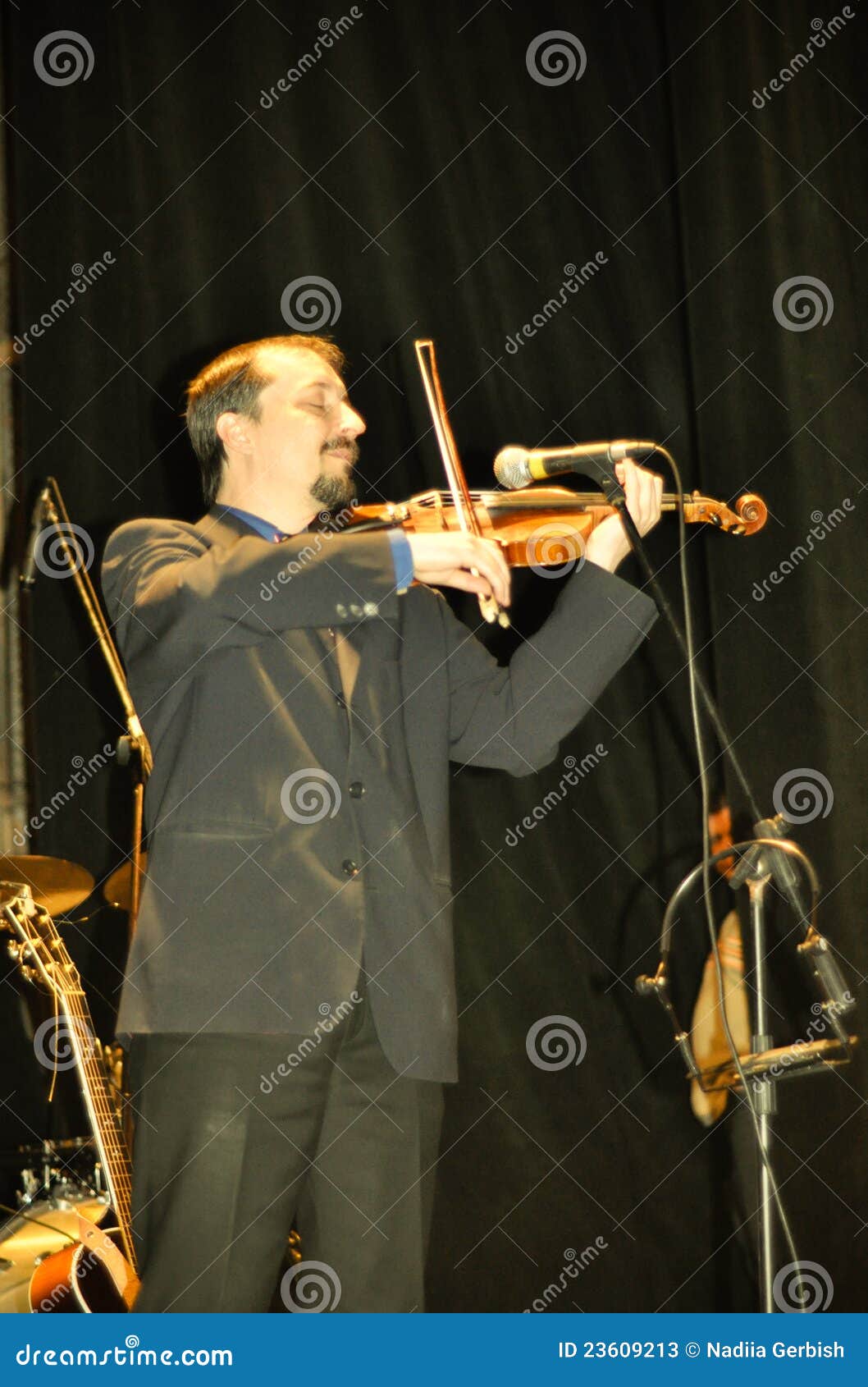 Musician at stage editorial stock photo. Image of male - 23609213