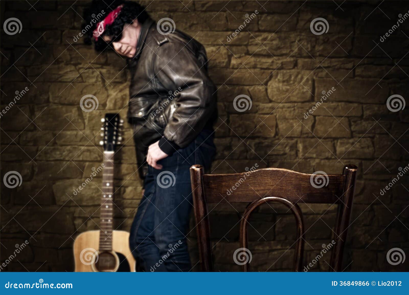 Musician Stands Against Wall Stock Photo - Image of cool, casual: 36849866