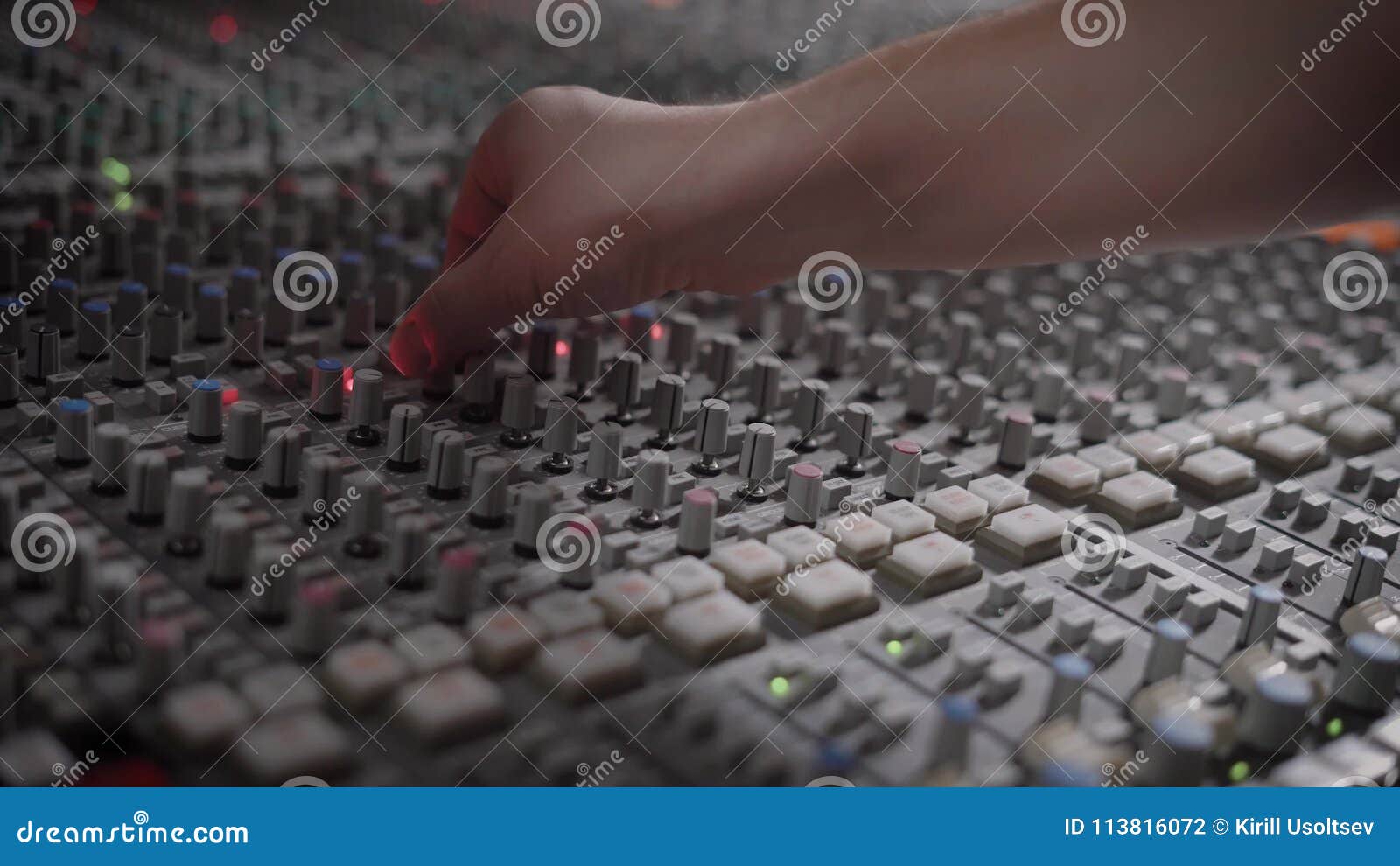Musician is Working in a Recording Studio with a Mixing Console. Stock ...