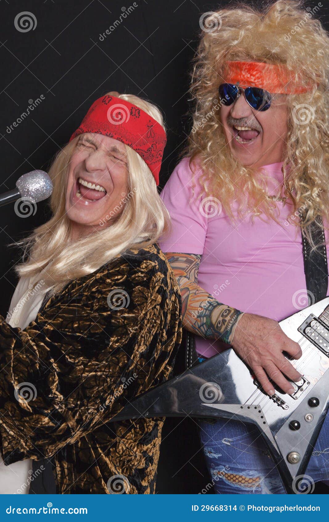 Musicians Giving a Rocking Performance Stock Photo - Image of outfit ...