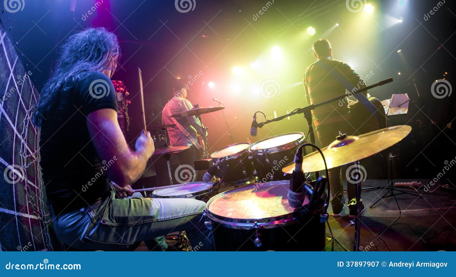 Musicians play on stage stock image. Image of light, drumstick - 37897907
