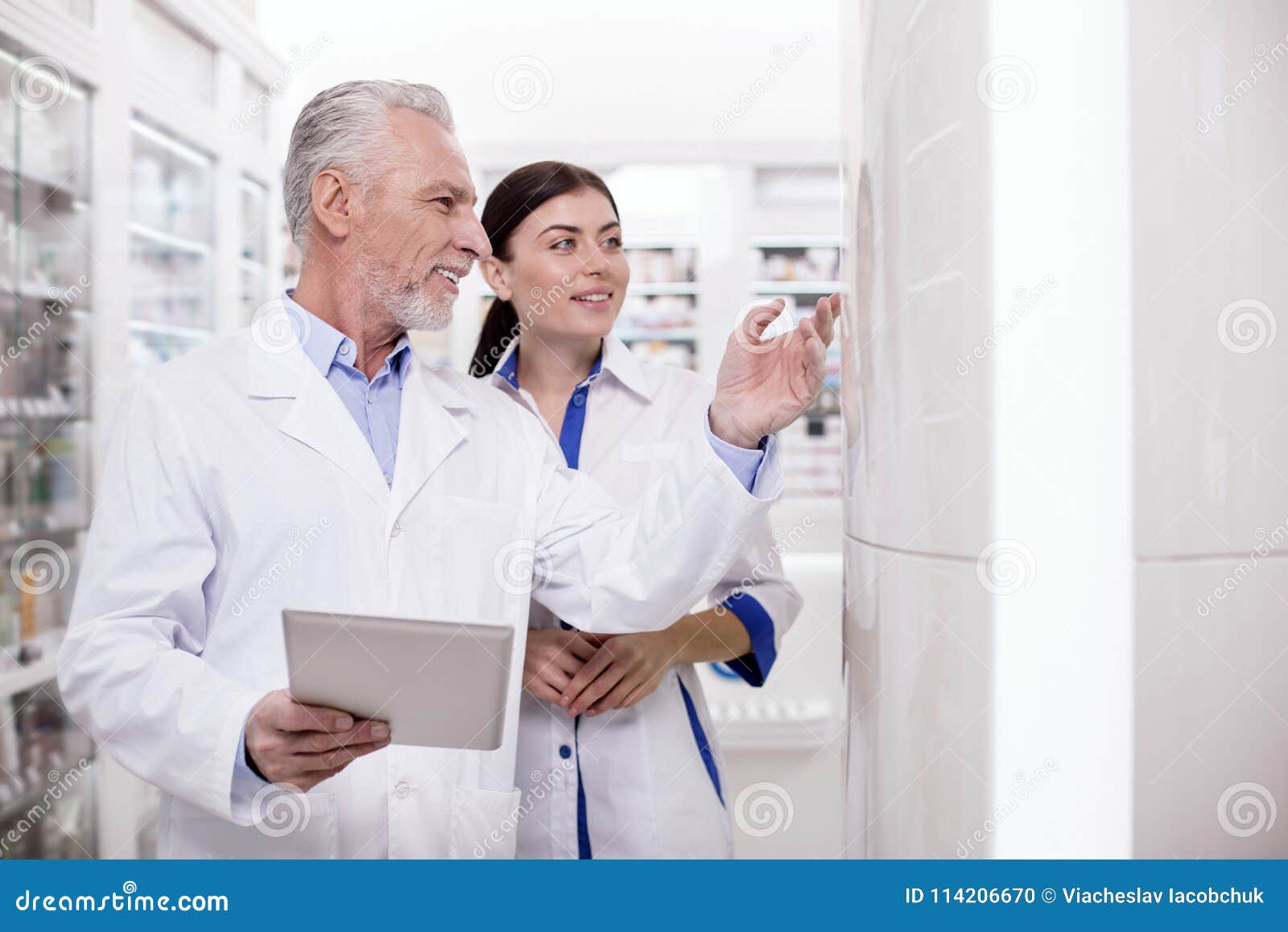 Musing Two Pharmacists Collaborating Stock Photo - Image of competence ...