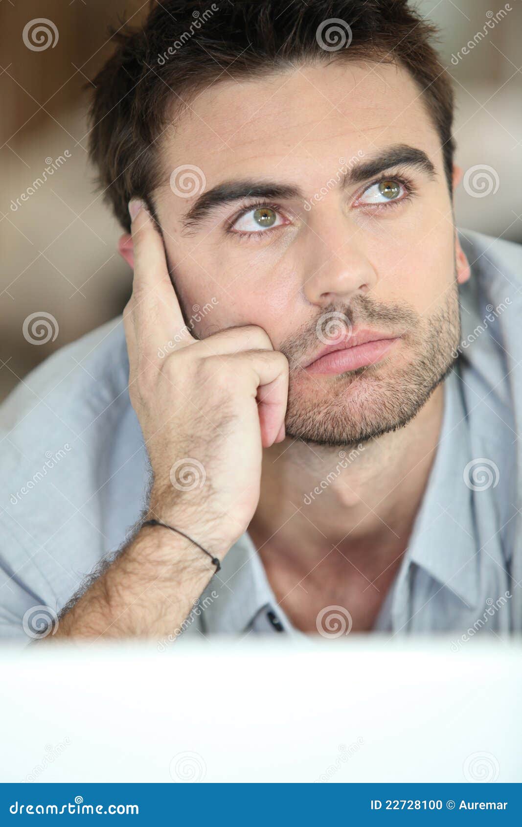 Musing Young Man Looking Upwards Stock Photo - Image of idle, looking ...