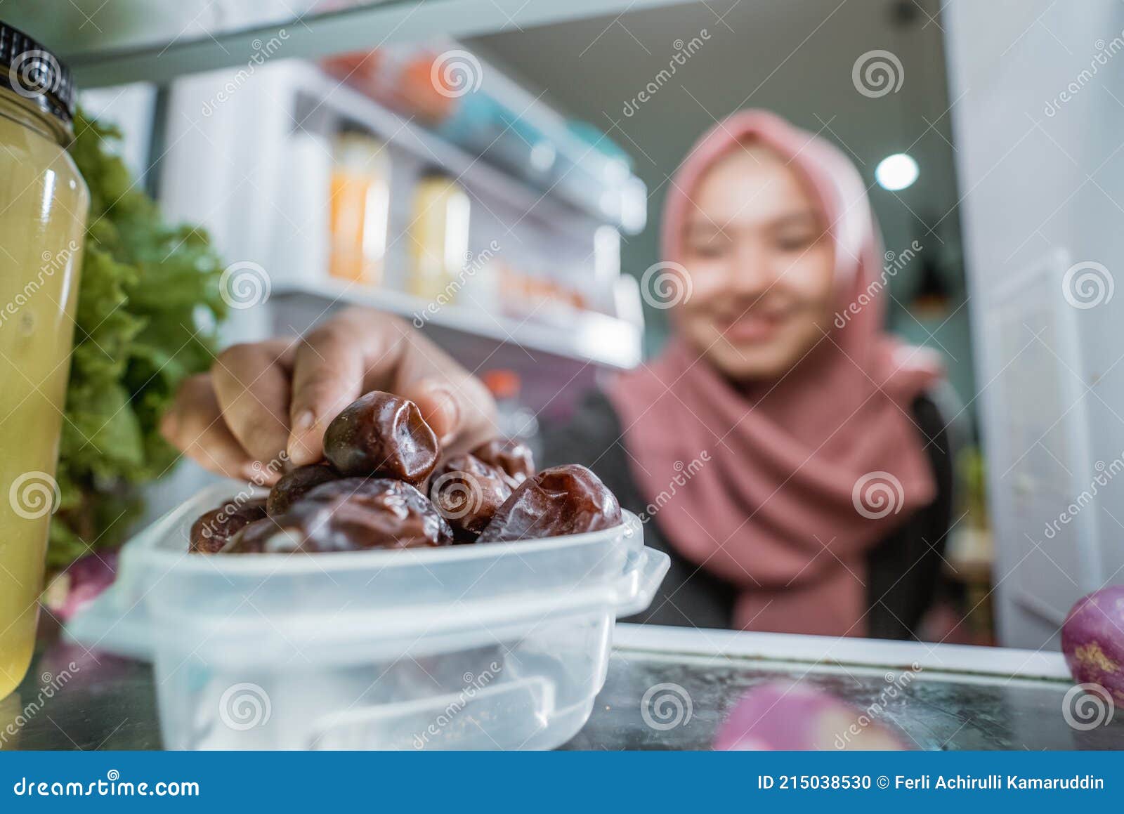 A Dates By A Woman Finger Using A Chop Sticks Royalty-Free Stock Photo ...