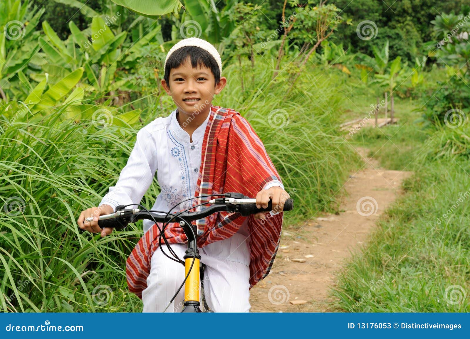Muslim Boy stock image. Image of green, bike, cycling - 13176053