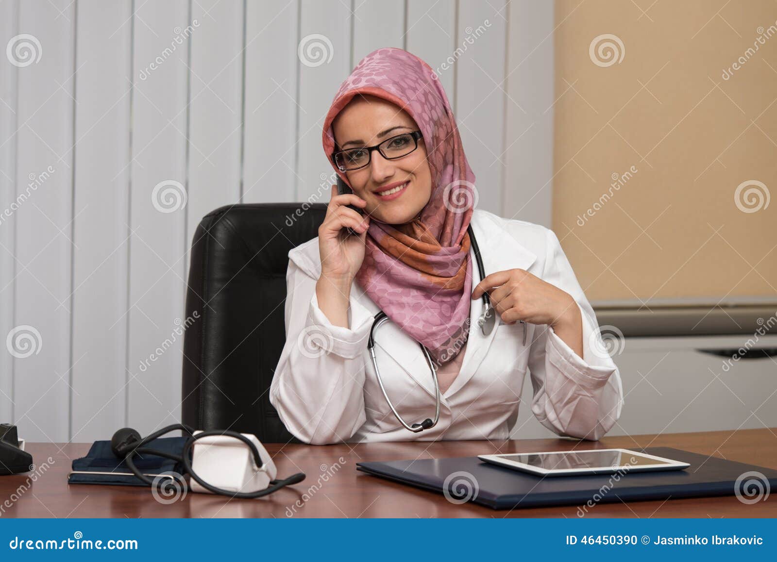 Muslim Doctor Talking Telephone Using Computer Stock Photos - Free ...