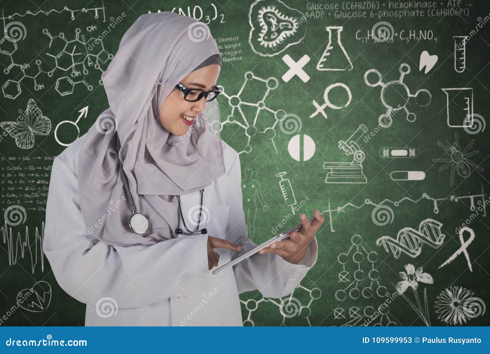 Muslim Doctor Using a Digital Tablet Stock Image - Image of chalkboard ...