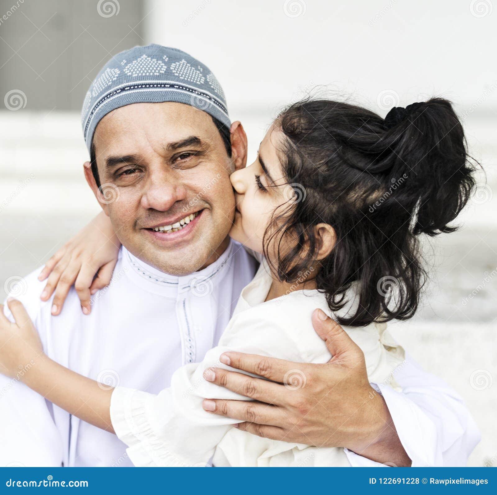 Muslim Father And Son Praying Together. Muslim Dad And Son Praying In ...