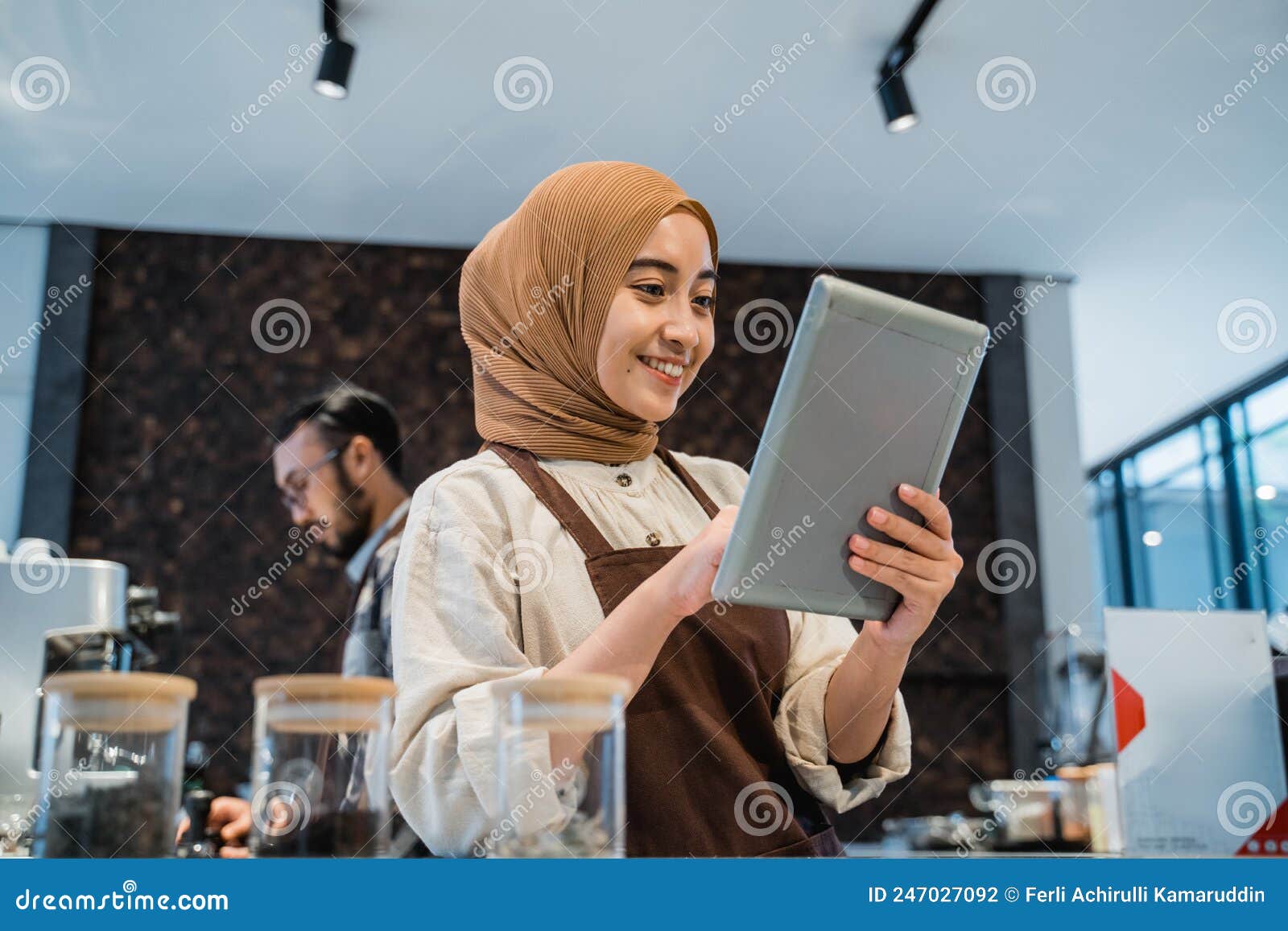 Muslim Female Cafe Owner Use Tablet while Working Stock Photo - Image ...