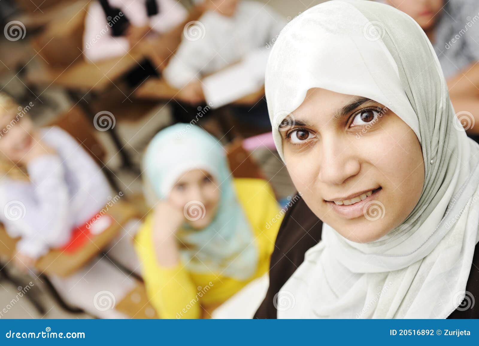 Muslim Female Teacher in Classroom Stock Photo - Image of covered ...