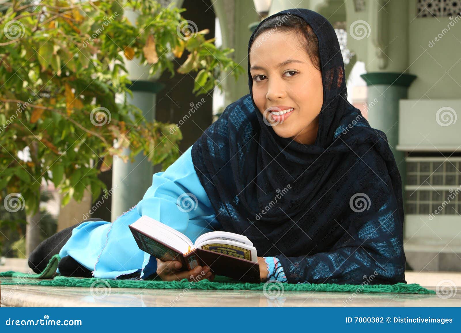 Muslim Girl Reading Qur an stock photo. Image of positive - 7000382