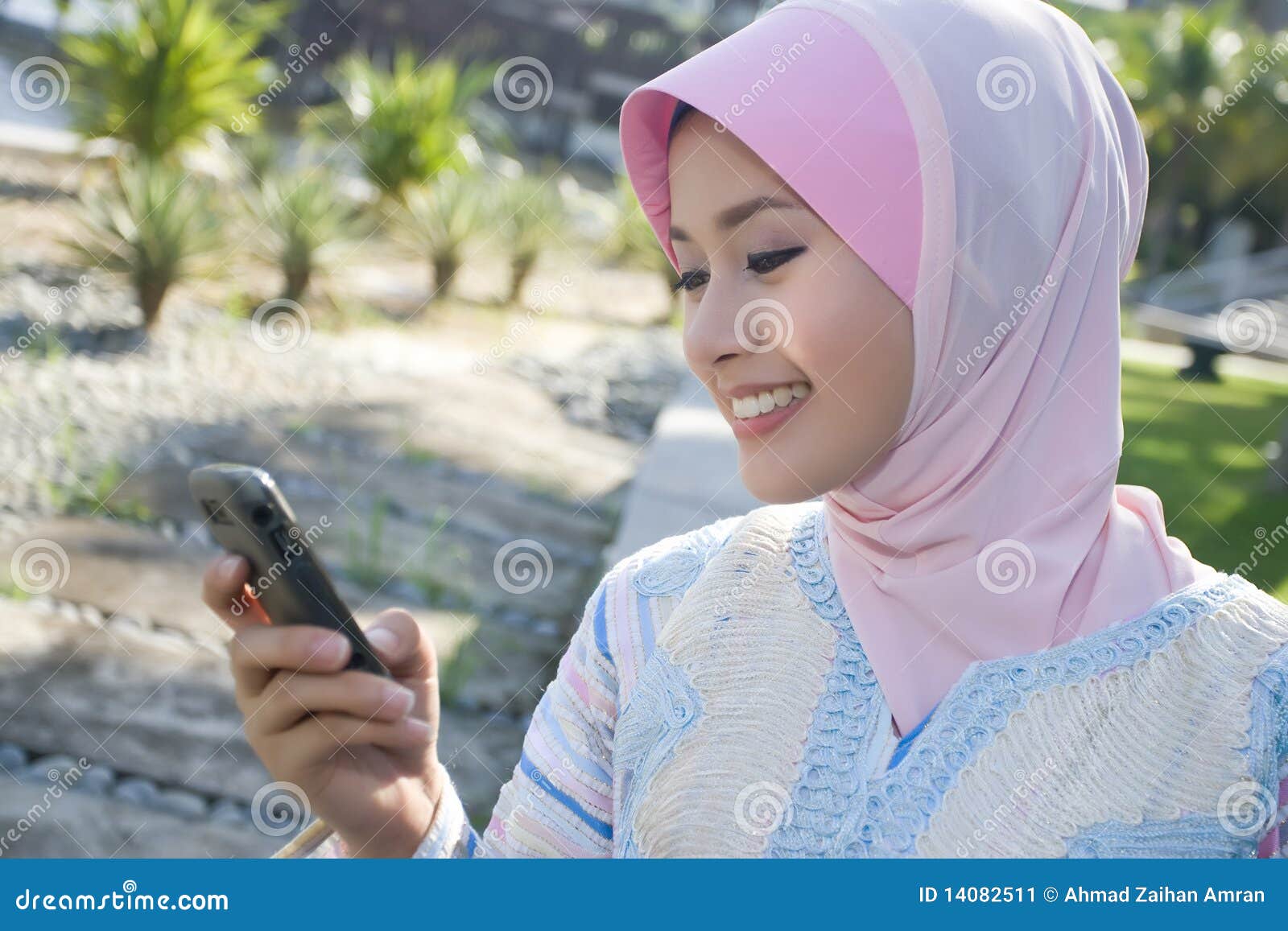 Muslim Girl are Using Handphone Stock Image - Image of diversity, islam ...