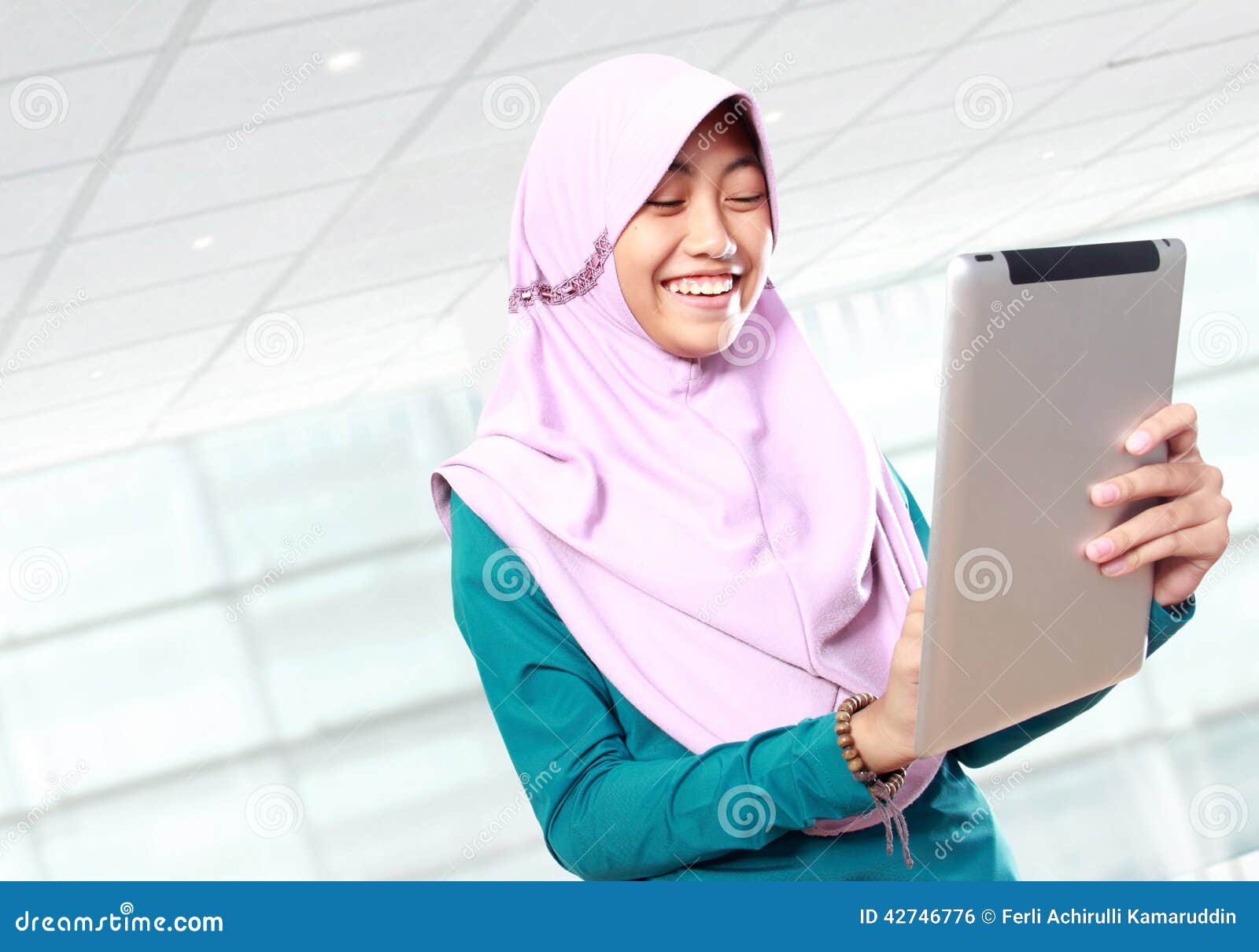 Muslim Girl Using Tablet Computer Stock Photo - Image of islamic ...