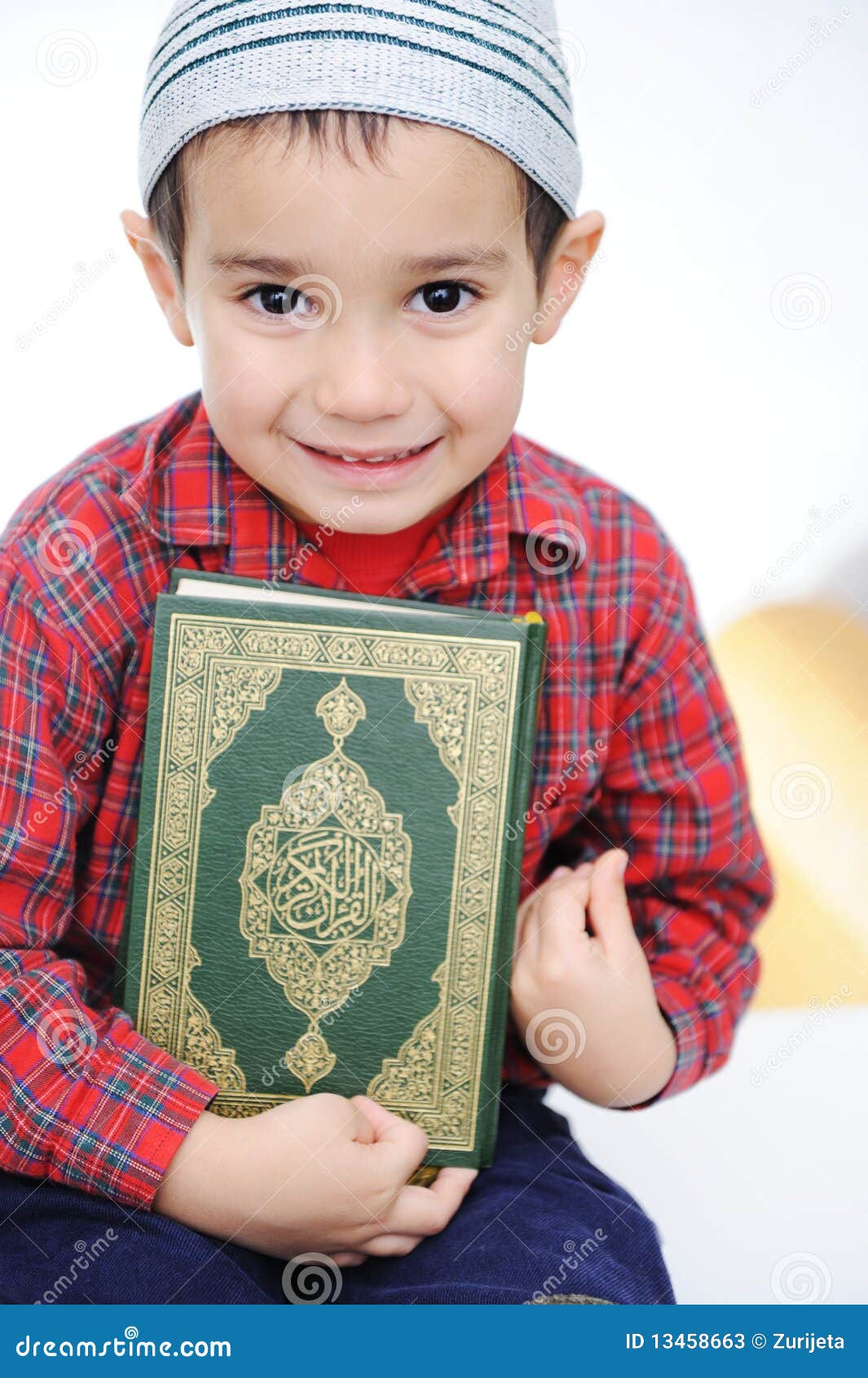 Muslim kid with holy Koran stock image. Image of child - 13458663