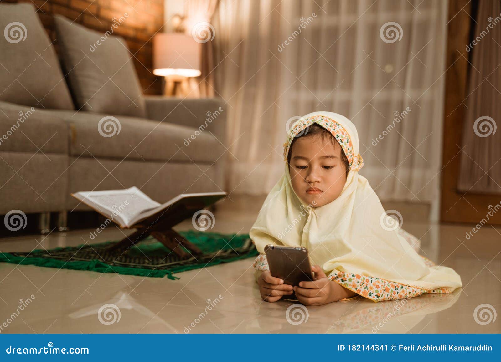 Muslim Kid Using Mobile Phone after Praying Stock Image - Image of ...